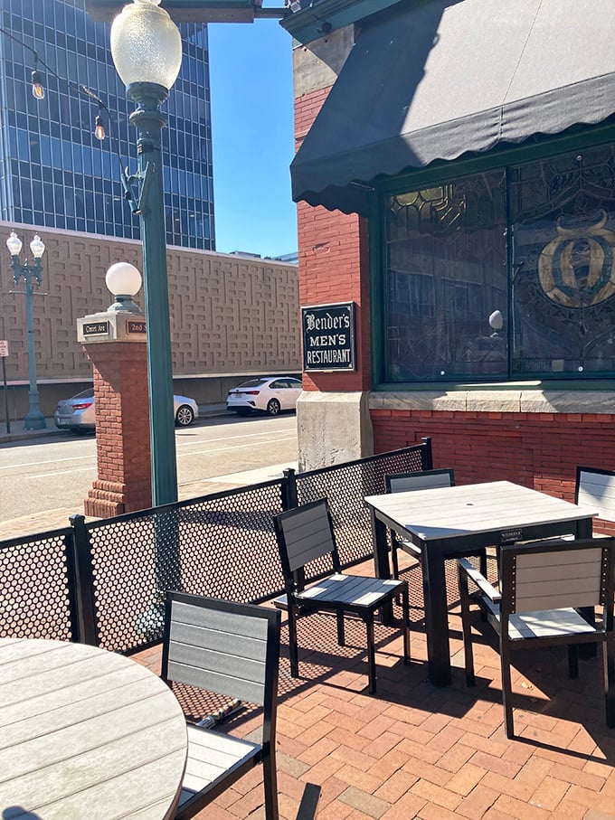 Outdoor seating where modern Canton meets historic charm. The sign "Bender's Men's Restaurant" hints at the establishment's fascinating evolution through changing times.