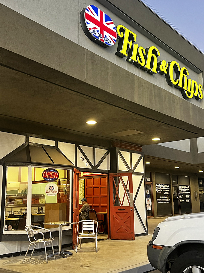 The Tudor-style exterior with its distinctive Union Jack sign stands as a beacon for those seeking authentic fish and chips.