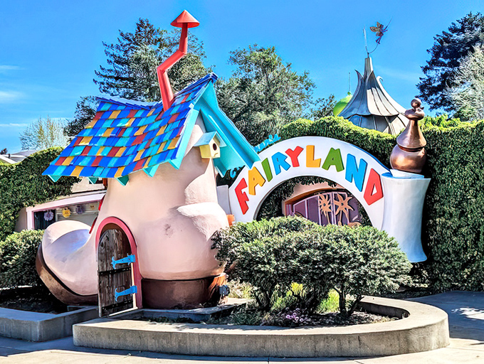 The entrance to Fairyland beckons with storybook architecture that whispers, "Adults, prepare to remember; children, prepare to dream."