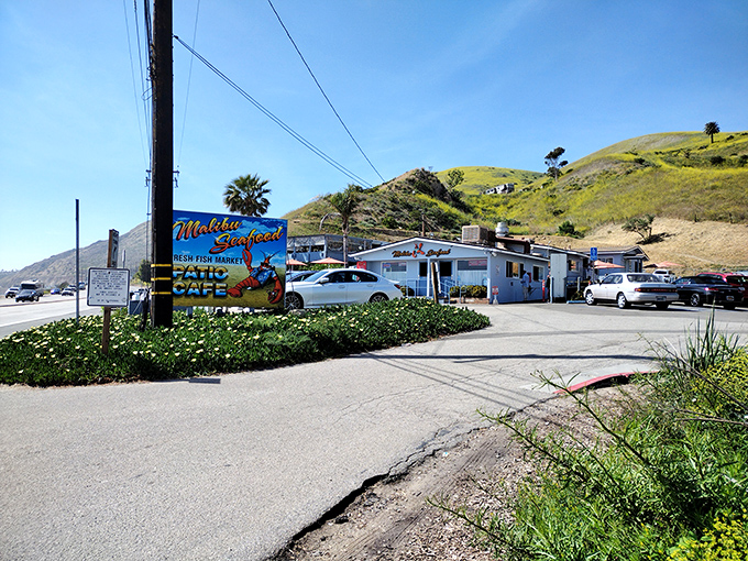 Nestled between hills and highway, this seafood oasis has been luring hungry travelers for decades. The sign is like a maritime bat signal for seafood lovers.