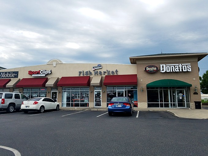The unassuming parking lot of culinary dreams. Cars gather like pilgrims at a shrine&mdash;each driver on a mission for maritime delicacies.