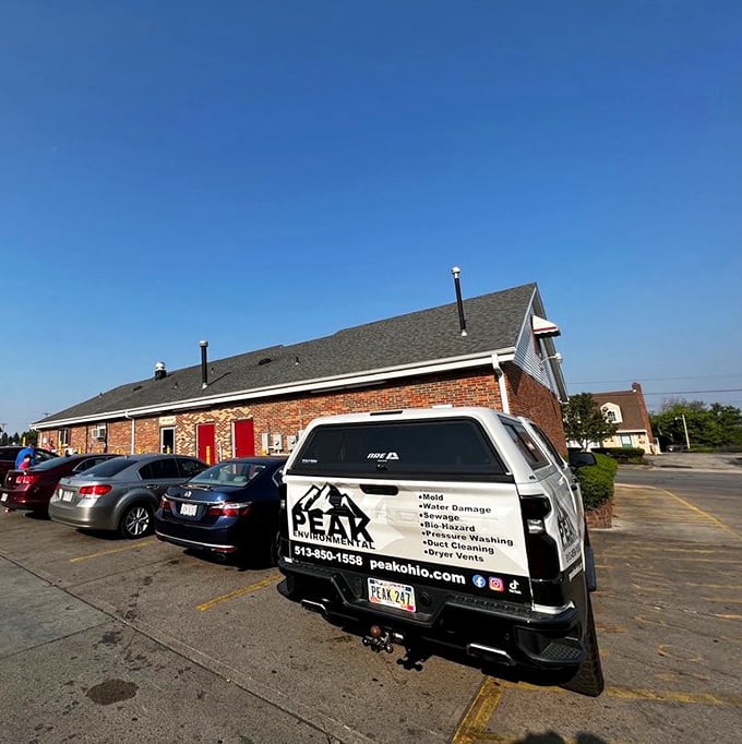 The parking lot&mdash;where anticipation begins and diet resolutions end. Cars of all makes and models united by a common sugary purpose.