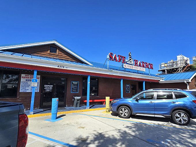 A parking lot filled with both luxury cars and pickup trucks &ndash; seafood: the great equalizer of Florida's social classes.