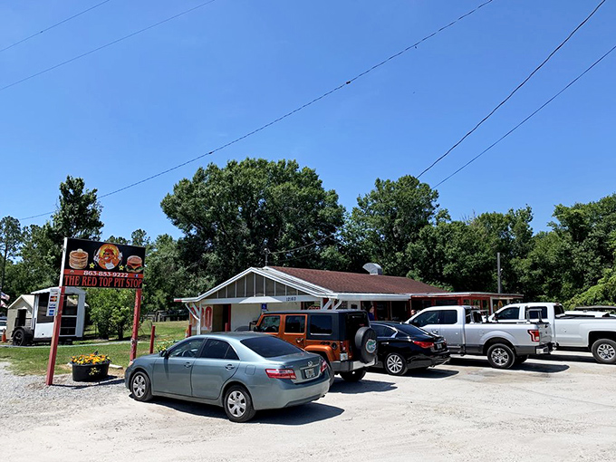 A packed parking lot tells you everything you need to know. When locals line up their trucks outside, you've found the real deal.