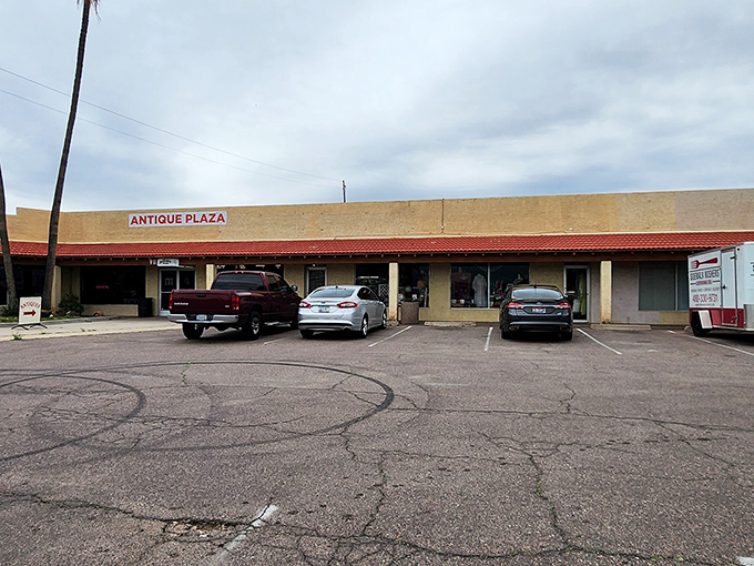 Don't let the ordinary parking lot fool you – beyond those doors lies an extraordinary journey through America's collective attic.