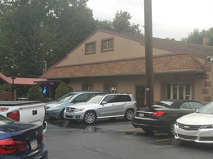 A packed parking lot&mdash;the universal sign language for "the food here is worth waiting for." Local license plates tell you this isn't just a tourist trap.
