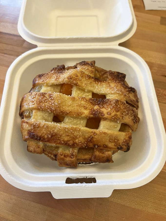 Lattice-top pie that would make your grandmother simultaneously proud and jealous. The to-go container is optimistic&mdash;this won't make it home.