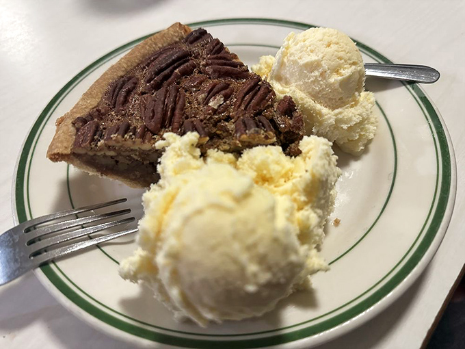 Pecan pie with ice cream&mdash;the dessert equivalent of a standing ovation. If happiness had a flavor, it would taste exactly like this. 