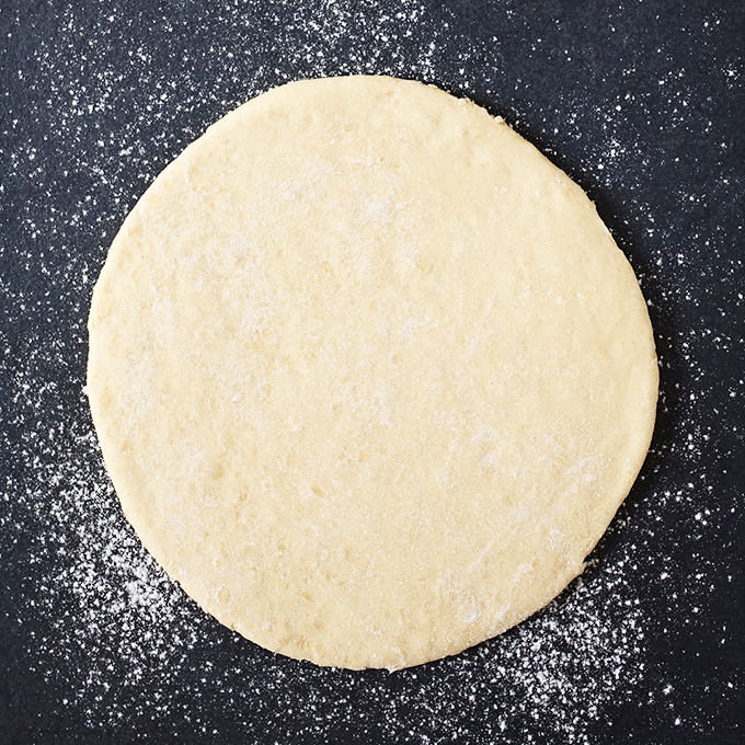 Before the sauce, before the cheese, before the toppings&mdash;there's this perfect circle of possibility, waiting to become someone's dinner memory.