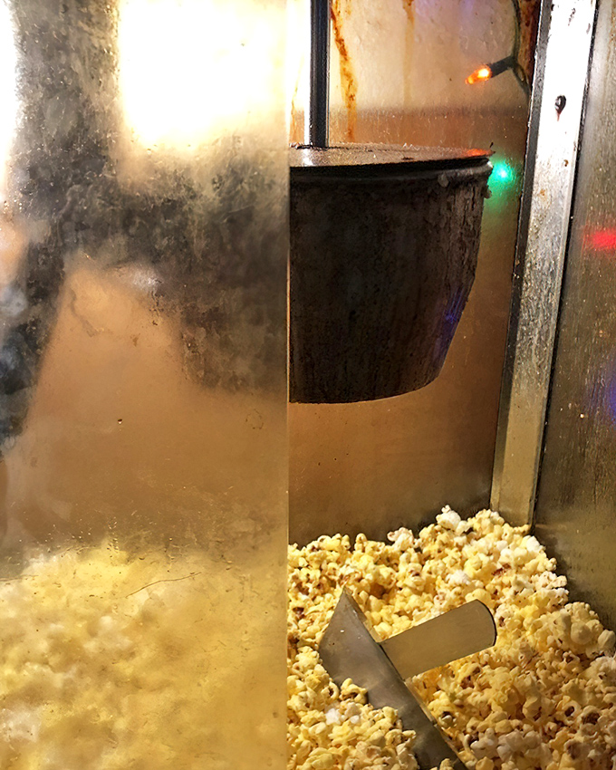 Free popcorn while you wait&mdash;because the only thing better than anticipation is anticipation with a snack. Pure genius.