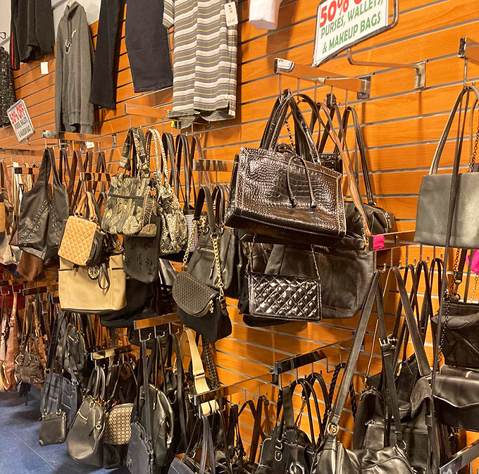 Handbag heaven for the accessory enthusiast. Designer lookalikes mingle with genuine vintage pieces in this leather and fabric social gathering.