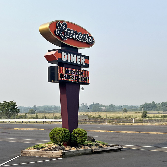 The roadside sign stands tall like a lighthouse guiding hungry travelers to safe harbor. Many a breakfast emergency has been averted by this beacon.