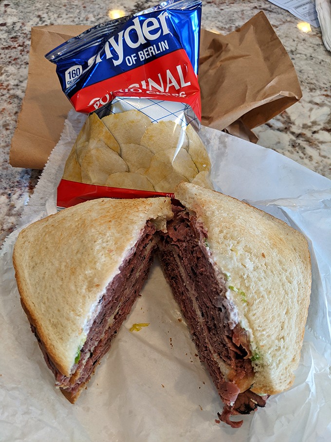 Roast beef layered with the precision of a watchmaker, creating a sandwich that's both a visual masterpiece and a triumph of flavor.