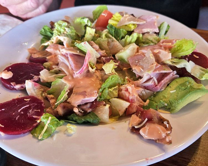 A salad that doesn't apologize for being a salad. Those beets and greens are playing supporting roles to seafood's star performance.