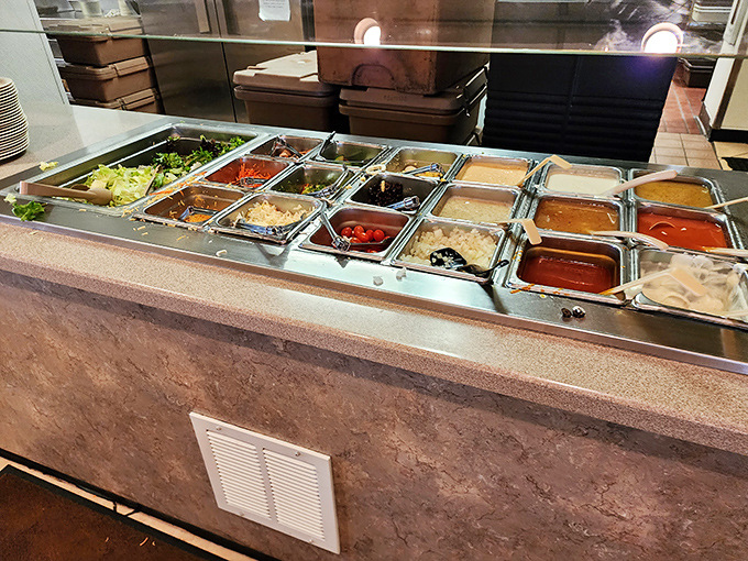 The salad bar—where good intentions meet reality. A colorful array of options that let you pretend you're being healthy before dessert arrives.