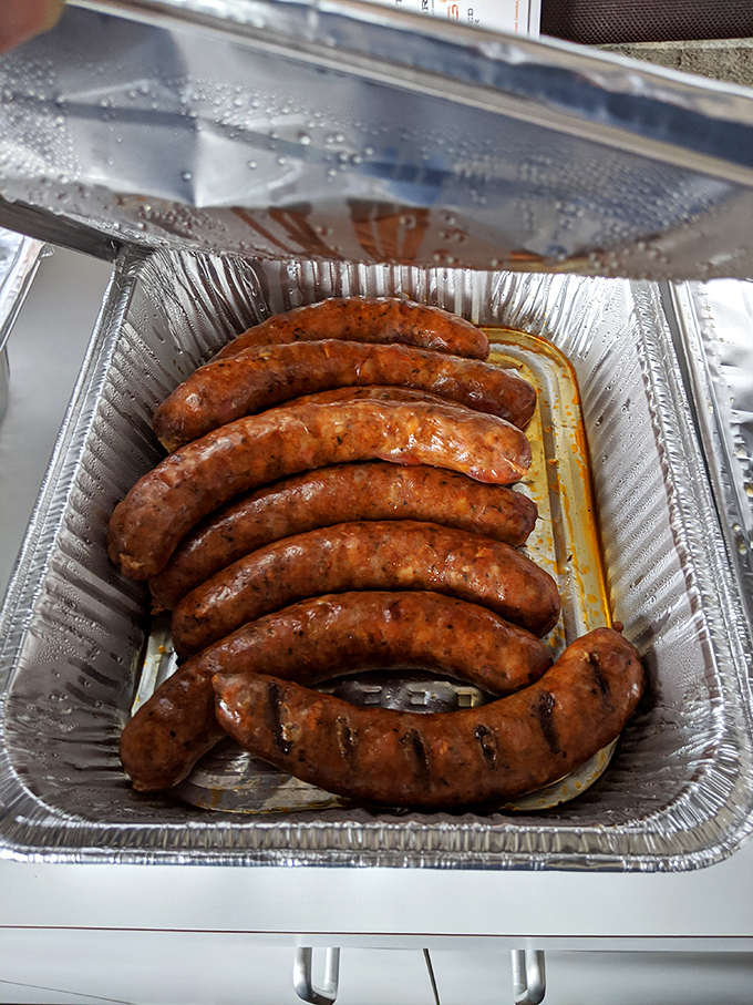 Sausages lined up like soldiers ready for delicious duty. That glistening surface promises a satisfying snap with each bite.