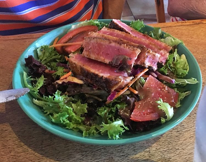 Seared tuna with the perfect pink center &ndash; rare as finding a parking spot at the beach on a holiday weekend. A salad that's definitely not settling.