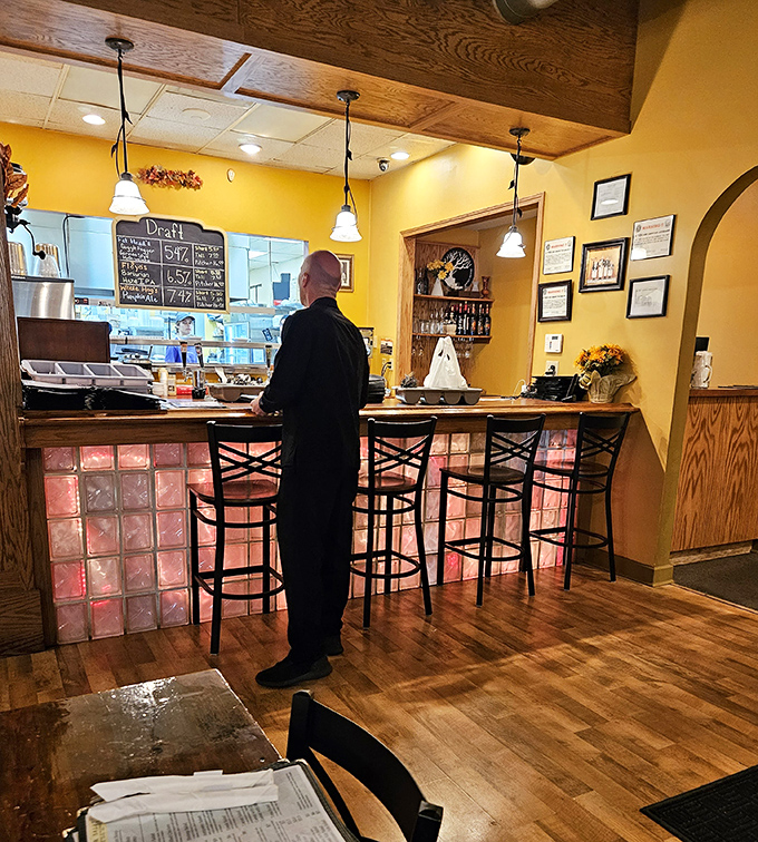 The bar area&mdash;where strangers become friends and friends become family, all united by the universal language of good food and drink.