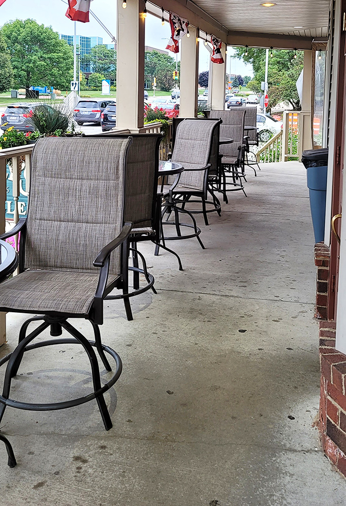 The covered porch features comfortable seating where you can enjoy fresh air and anticipate the butter burger that's about to change your life.