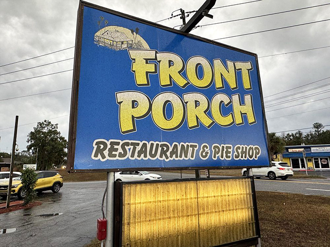 The sign stands like a beacon of hope for hungry travelers. "Front Porch Restaurant & Pie Shop"&mdash;eight words that promise happiness. 