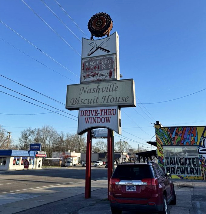 A roadside beacon of breakfast hope&mdash;the Nashville Biscuit House sign stands tall, guiding hungry travelers to their morning salvation.
