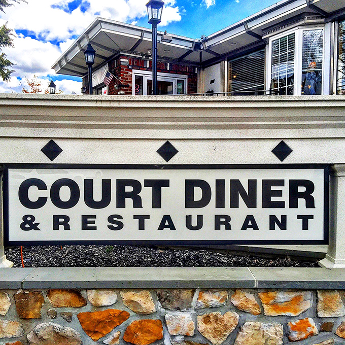 That sign isn't just announcing a restaurant&mdash;it's signaling a landmark. Court Diner's stone and brick foundation is as solid as its reputation.