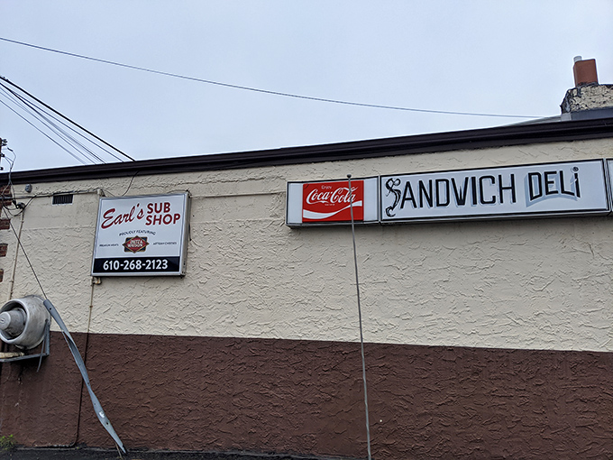 The side signage &ndash; announcing "Earl's Sub Shop" and "Sandwich Deli" with no pretense, just the straightforward promise of good eating ahead.