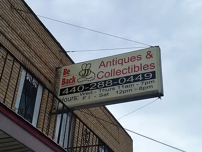 The sign promises treasures within and guarantees you'll "Be Back"&mdash;a name that's both clever wordplay and absolute truth for antique lovers.