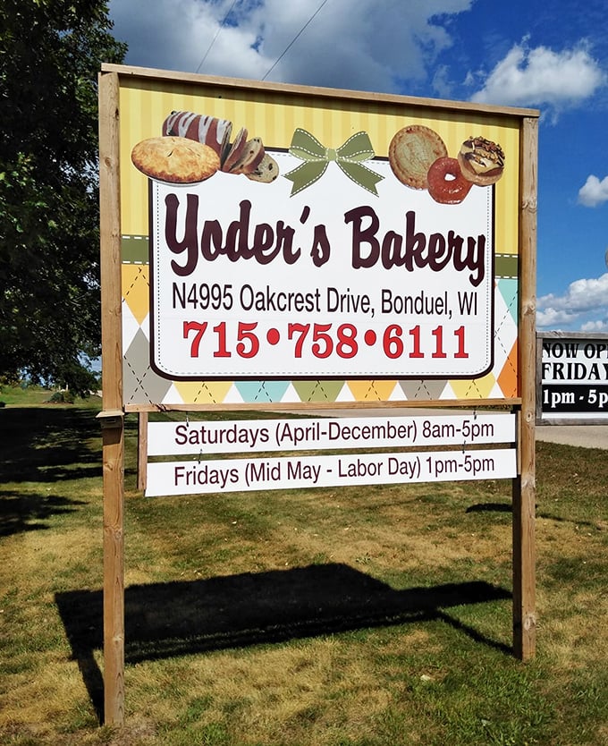 A sign that doesn't just mark a location—it announces a destination. Like a treasure map where X marks the spot for Wisconsin's best baked goods.