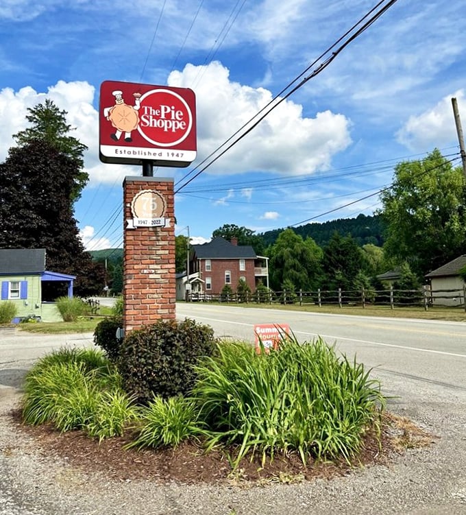 The sign that marks your arrival at pie paradise, where locals' bold claims about perfection prove true.
