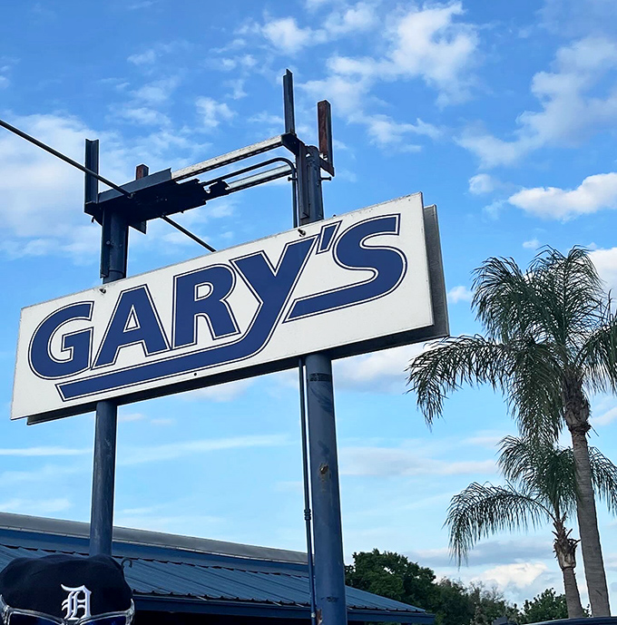 That sign against the Florida sky isn't just a name&mdash;it's a beacon for seafood pilgrims who know where the real treasures are hidden.
