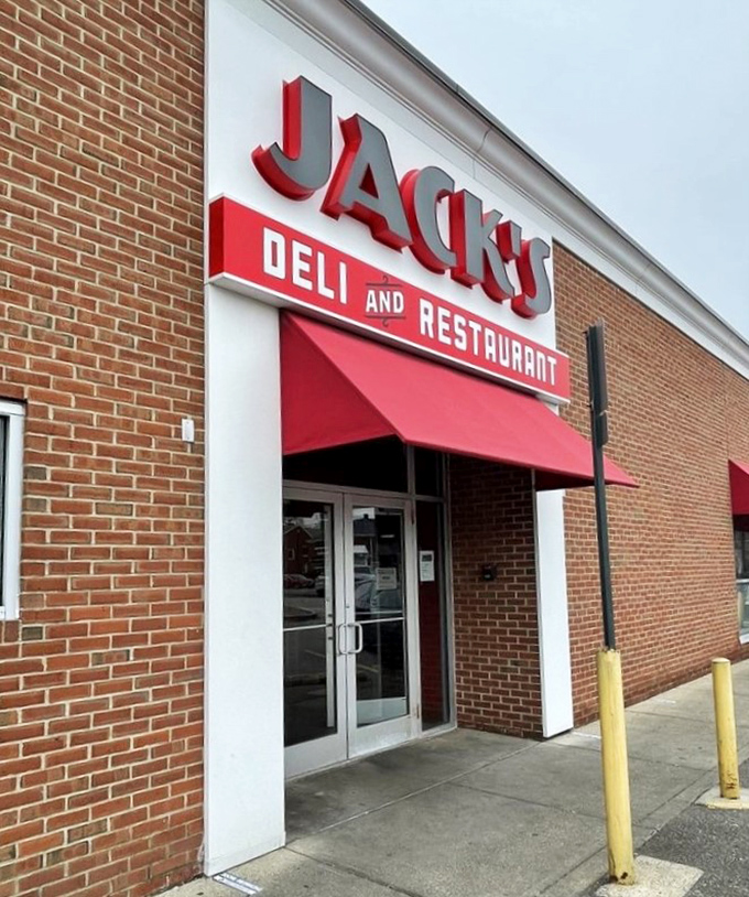 That iconic red signage beckons like a lighthouse for the hungry, guiding sandwich seekers safely to delicatessen shores.