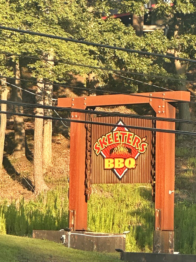 The sign that's guided countless hungry travelers to BBQ salvation, standing like a beacon of hope for empty stomachs.