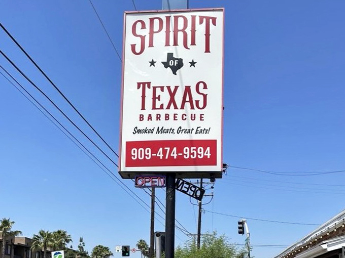 A beacon of hope for the barbecue faithful. This sign doesn't just mark a location&mdash;it promises a religious experience for your taste buds.