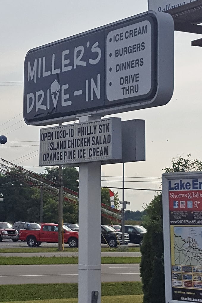 The roadside sign announces daily specials like town crier proclamations&mdash;Orange Pine ice cream today, happiness guaranteed all season long.