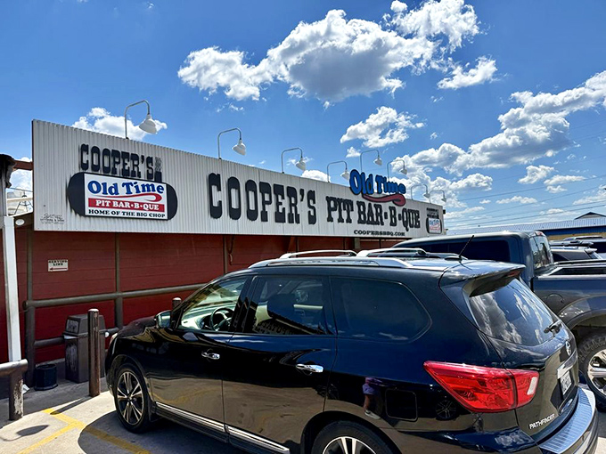 Under brilliant Texas skies, Cooper's sign promises what generations of barbecue lovers know to be true&mdash;authentic pit-smoked perfection awaits inside.