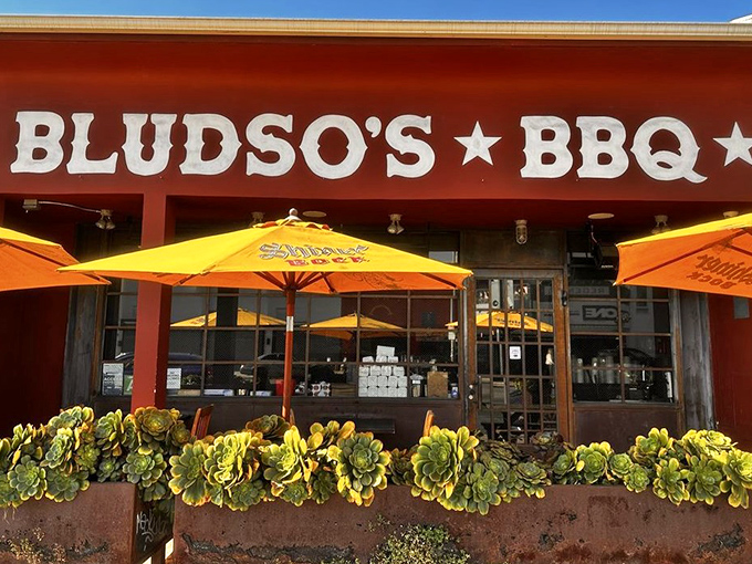 The sign promises exactly what awaits inside: no pretense, no gimmicks, just stellar BBQ that's earned its stars and stripes.