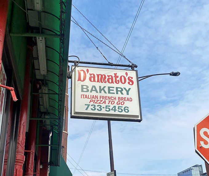The vintage sign swinging above the street has guided hungry Chicagoans for generations. Simple, straightforward, and promising everything you need.