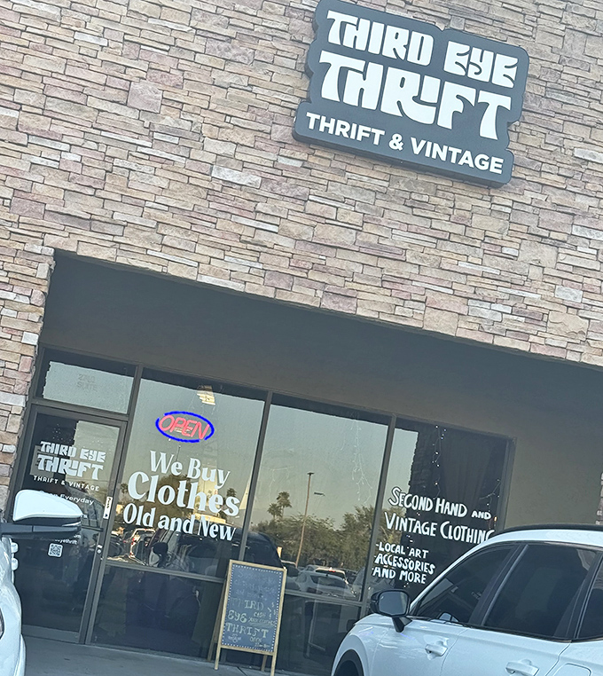 The welcoming storefront promises both vintage finds and the satisfaction of knowing your purchase gives perfectly good items a second chance.