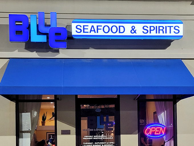 That vibrant blue signage isn't just a color choice—it's a promise of ocean-fresh delights waiting inside. Like a lighthouse for hungry seafood lovers.