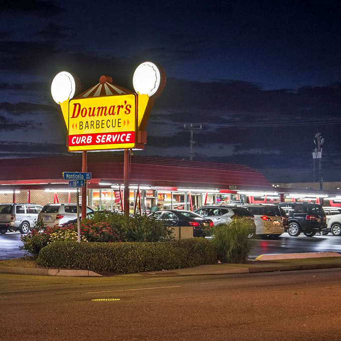 As darkness falls, that neon sign glows like a beacon of hope for hungry travelers. Some lights just guide you home.