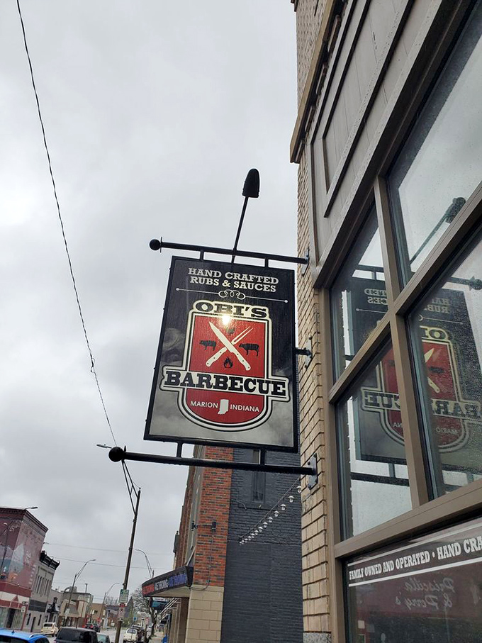 This sign doesn't just mark a restaurant&mdash;it's a beacon for the barbecue faithful. "Hand crafted" isn't just marketing; it's a solemn promise.