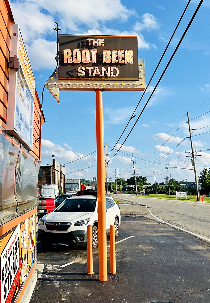 That sign isn't just advertising &ndash; it's a beacon calling hungry souls home to root beer salvation.