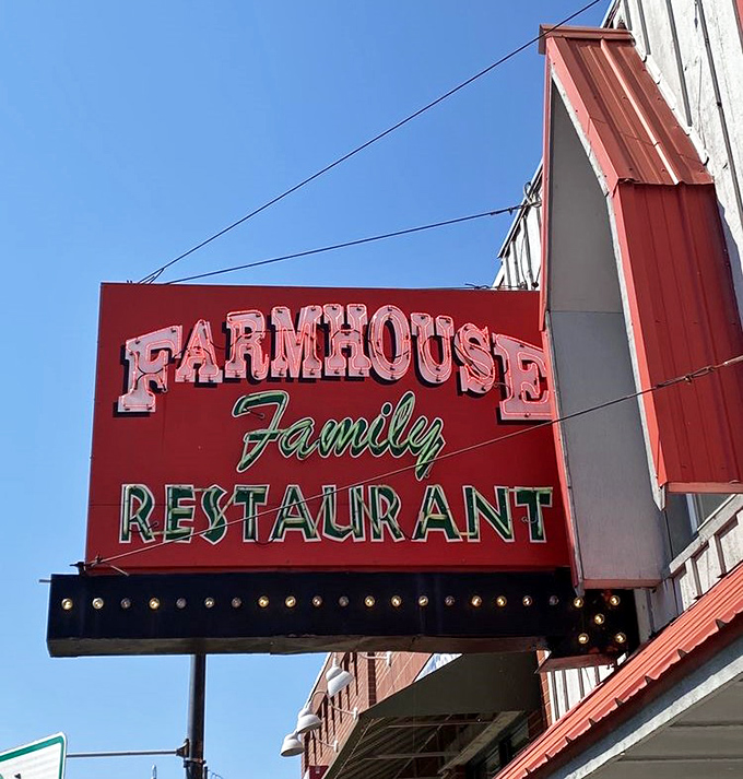That classic neon sign against the Branson sky &ndash; a beacon of hope for hungry travelers seeking authenticity in a world of chain restaurants.
