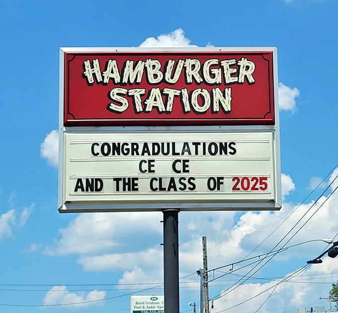 A sign that celebrates both burgers and community milestones. When your local burger joint knows what matters beyond the meal.