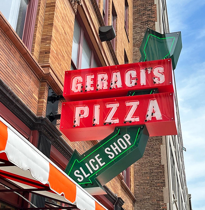 That neon sign glows like a pizza bat signal against Cleveland's brick buildings. Heroes respond with empty stomachs and high hopes.