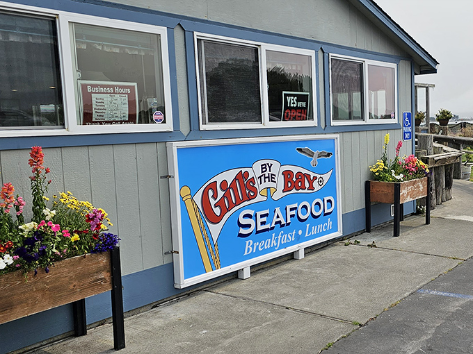 The sign promises seafood, breakfast, and lunch, but cleverly omits "life-changing chowder experiences" due to space limitations.