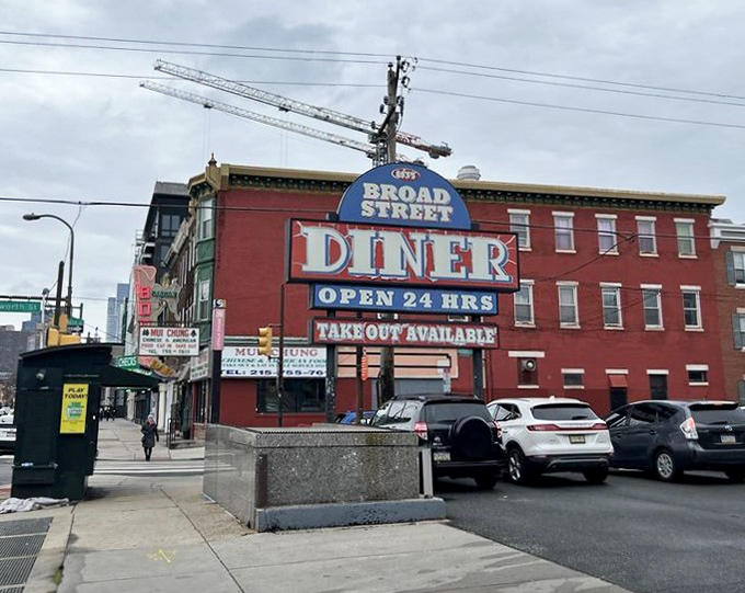 The iconic Broad Street Diner sign announces "OPEN 24 HRS" like a promise that comfort food is always within reach.