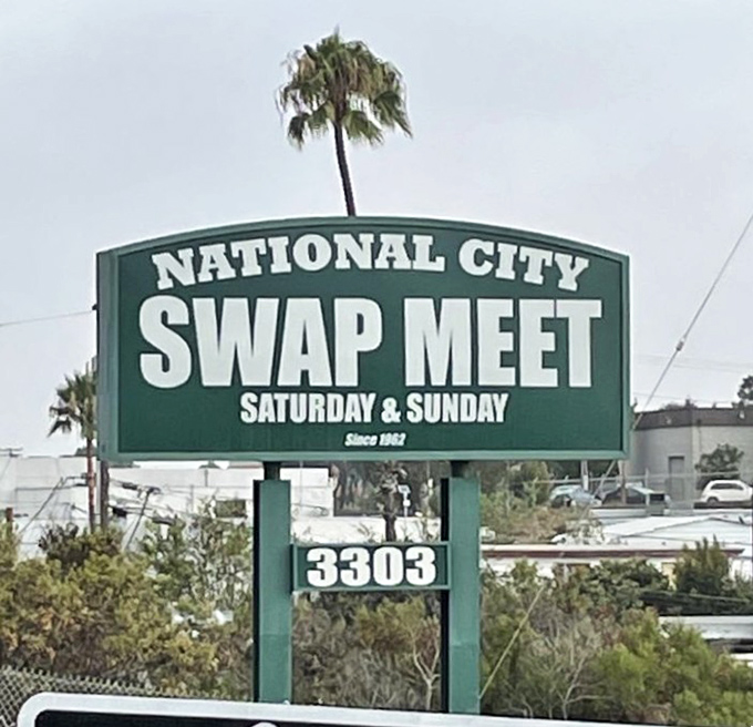 The iconic sign promises weekend adventures where your wallet stays happy and your shopping bags overflow.