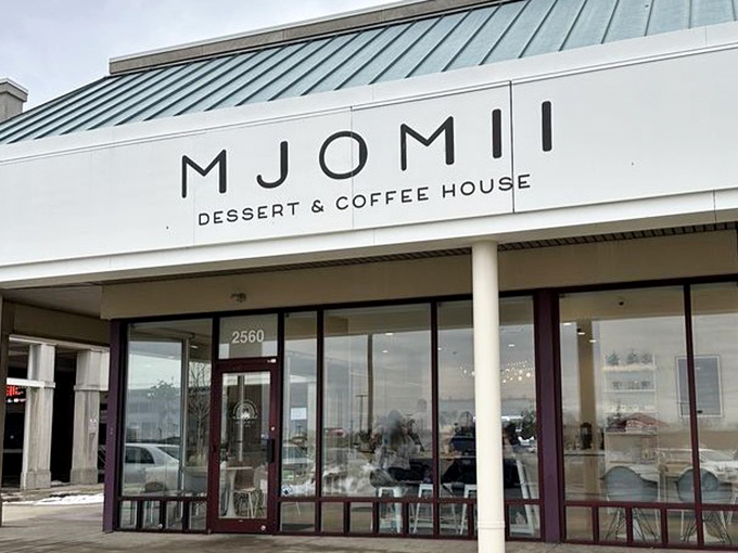 The promise of extraordinary experiences behind ordinary glass. Mjomii's exterior is like a book cover that hints at the delicious story within.